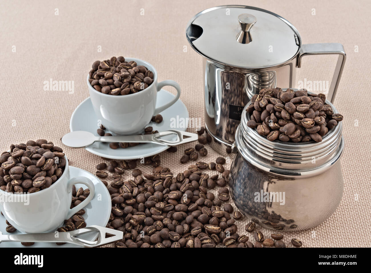 coffee beans with coffee pot and white cups 5 Stock Photo - Alamy