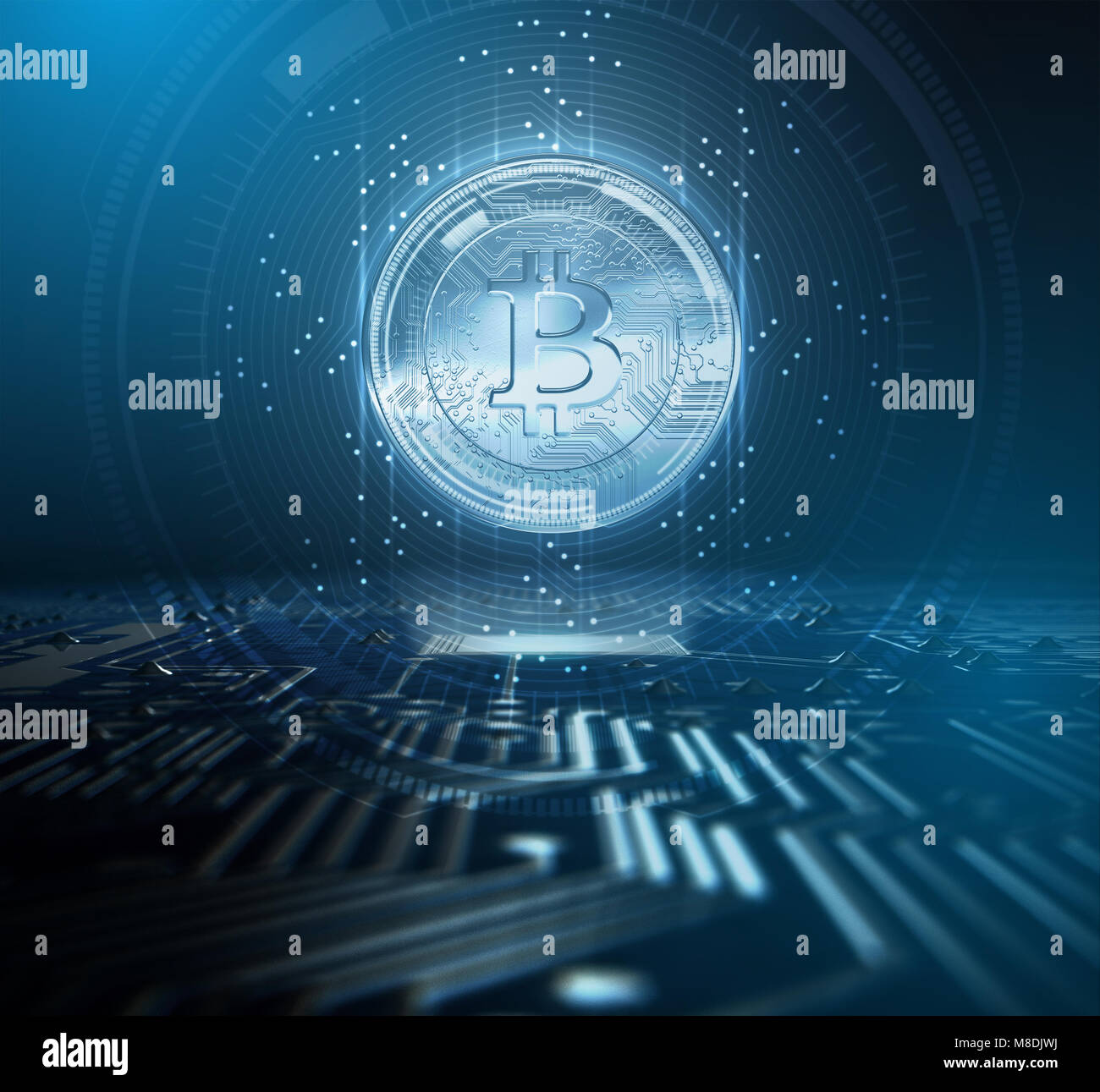 A bitcoin cryptocurrency hologram coin form hovvering over a computer ...