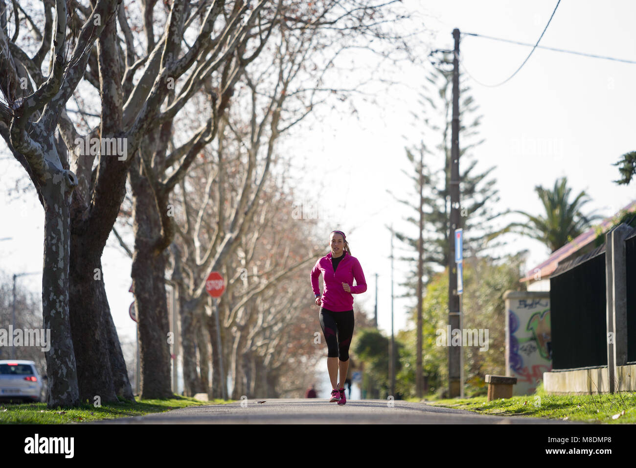 Woman in front tree hi-res stock photography and images - Alamy