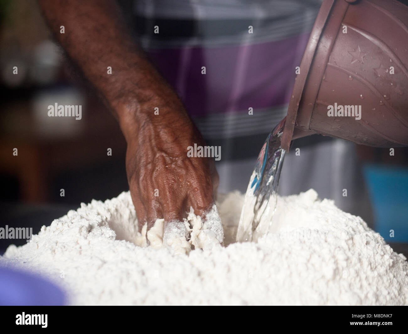 Man preparing roti dough Stock Photo - Alamy