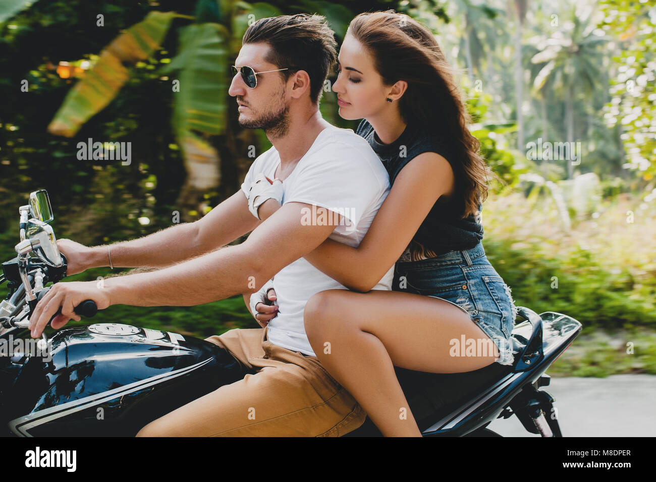 Couple riding motorcycle hi-res stock photography and images - Alamy