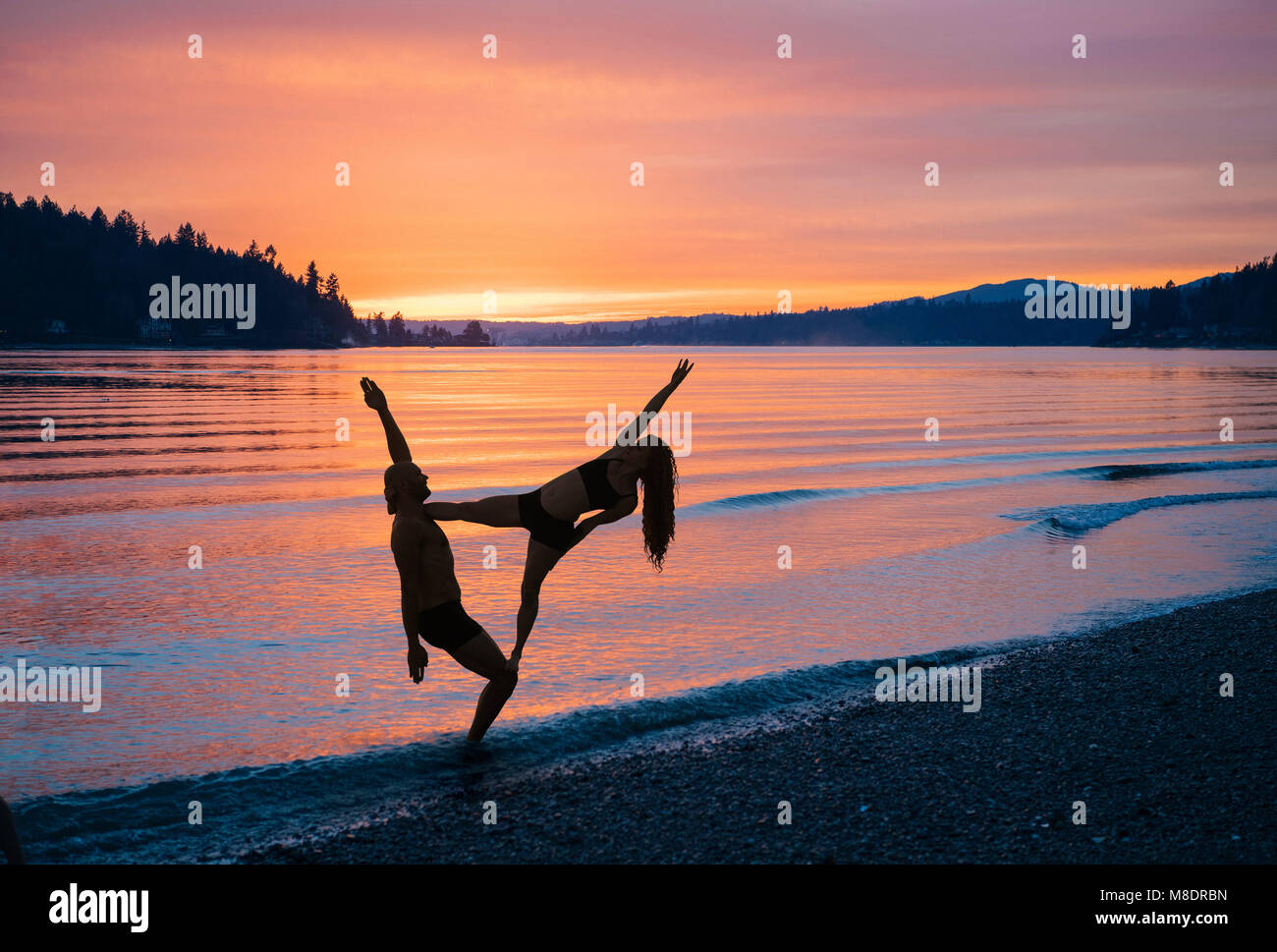 Male sunset yoga hi-res stock photography and images - Alamy