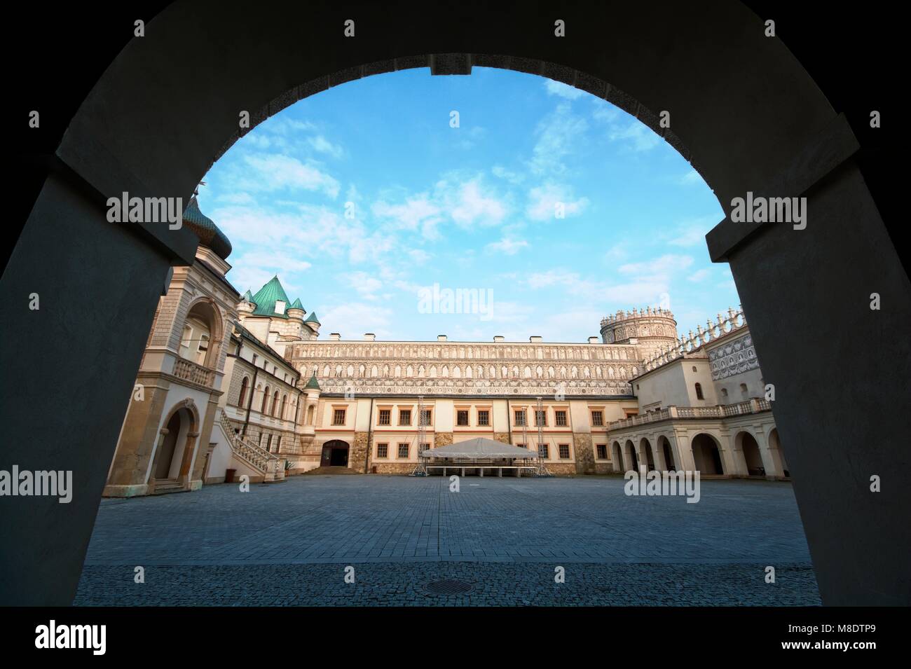 View of castle yard from entrance gate, Krasiczyn, Poland Stock Photo ...