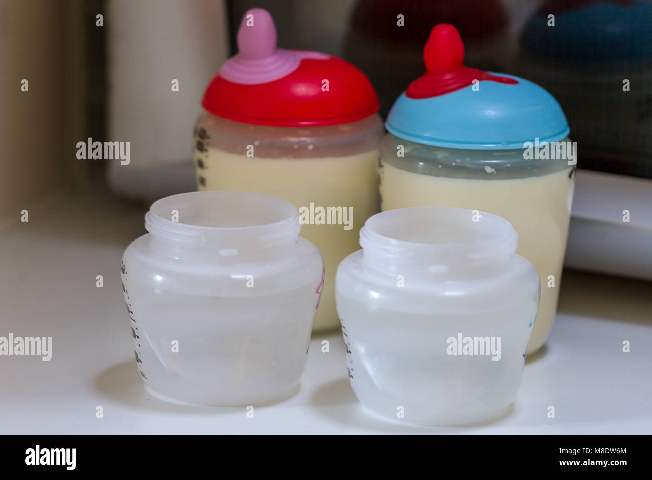 Two baby milk bottles Stock Photo - Alamy