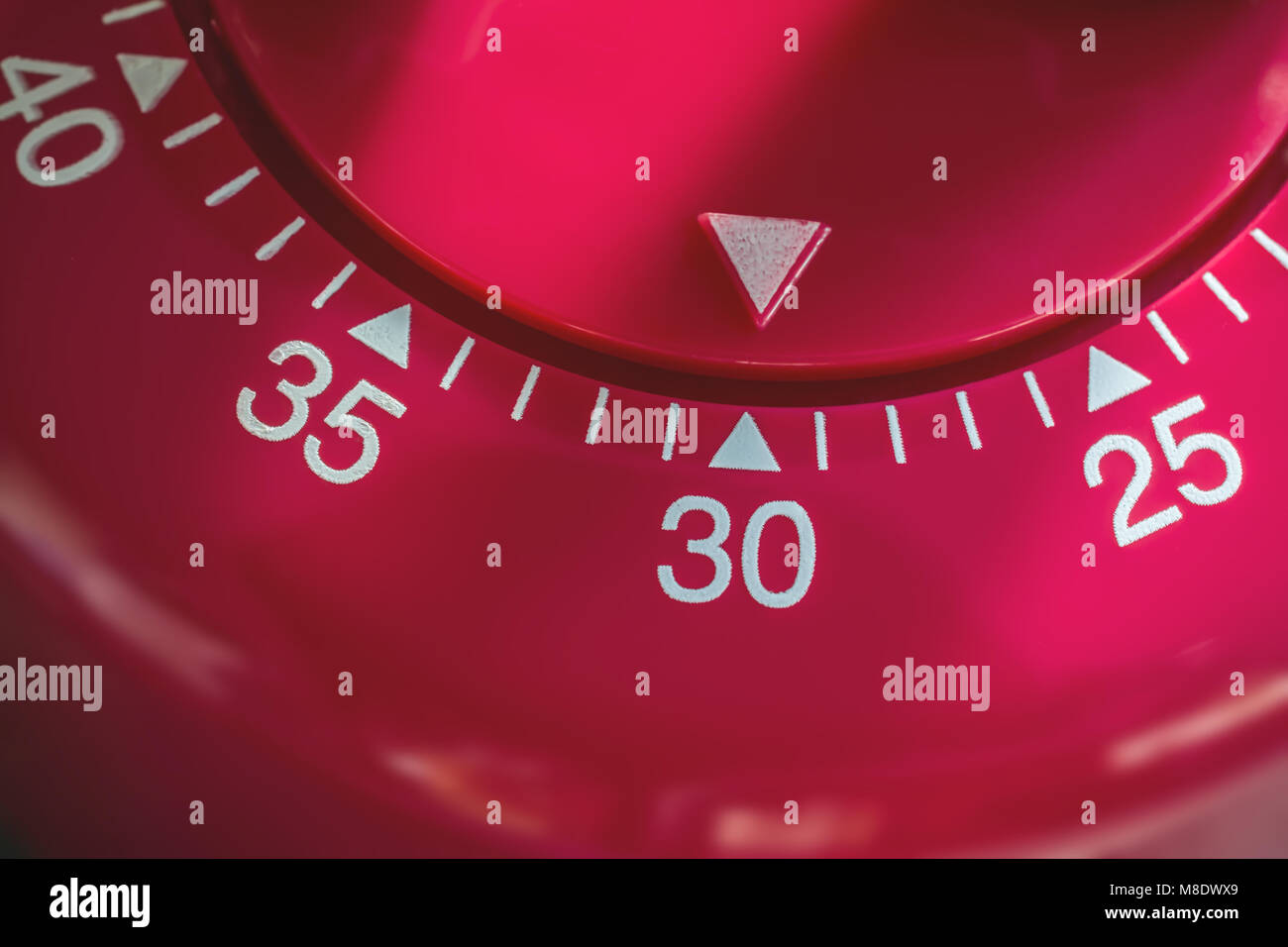 Macro Of A Kitchen Egg Timer - 30 Minutes Stock Photo - Alamy