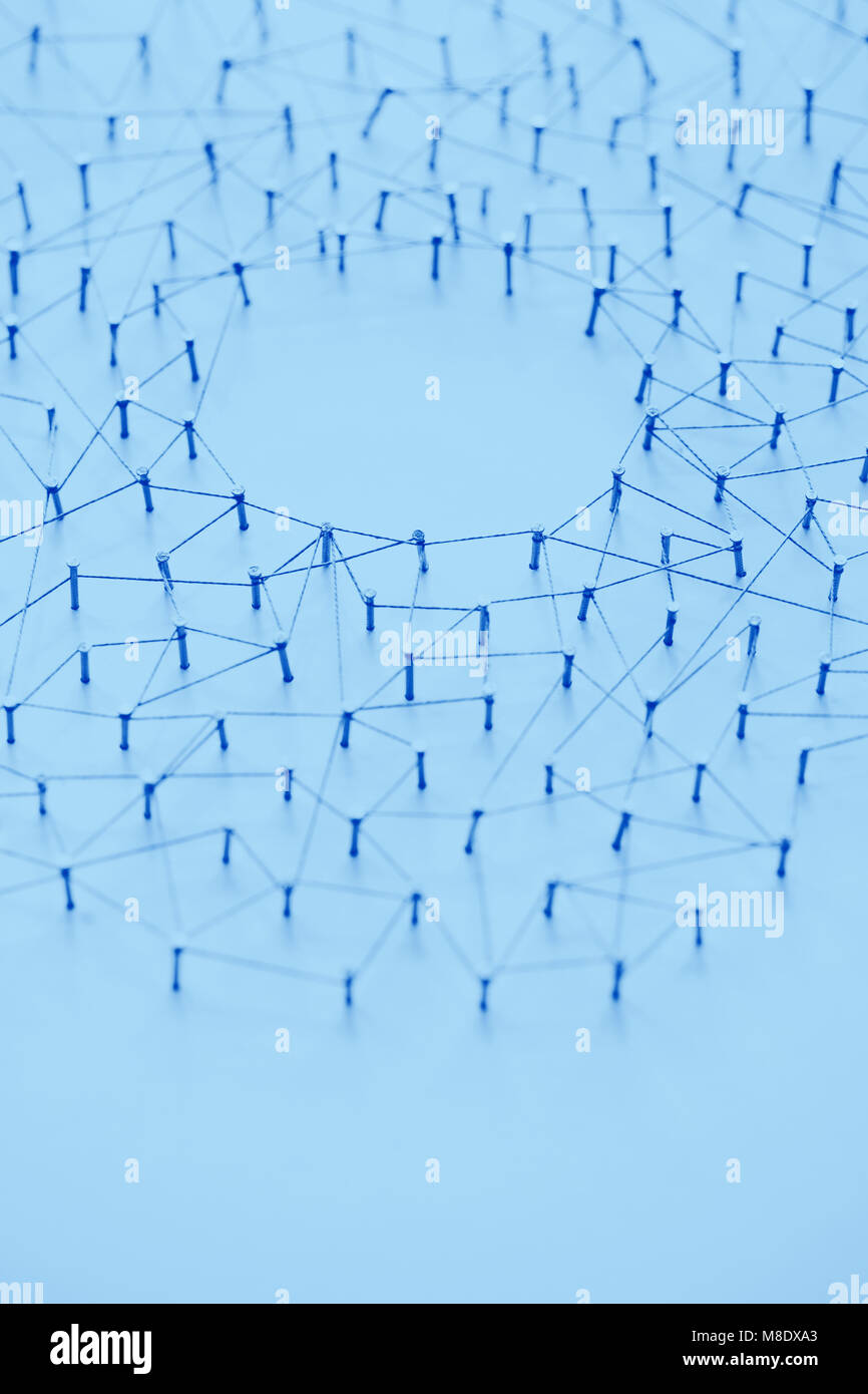 A large grid of pins connected with string. Communication, technology ...