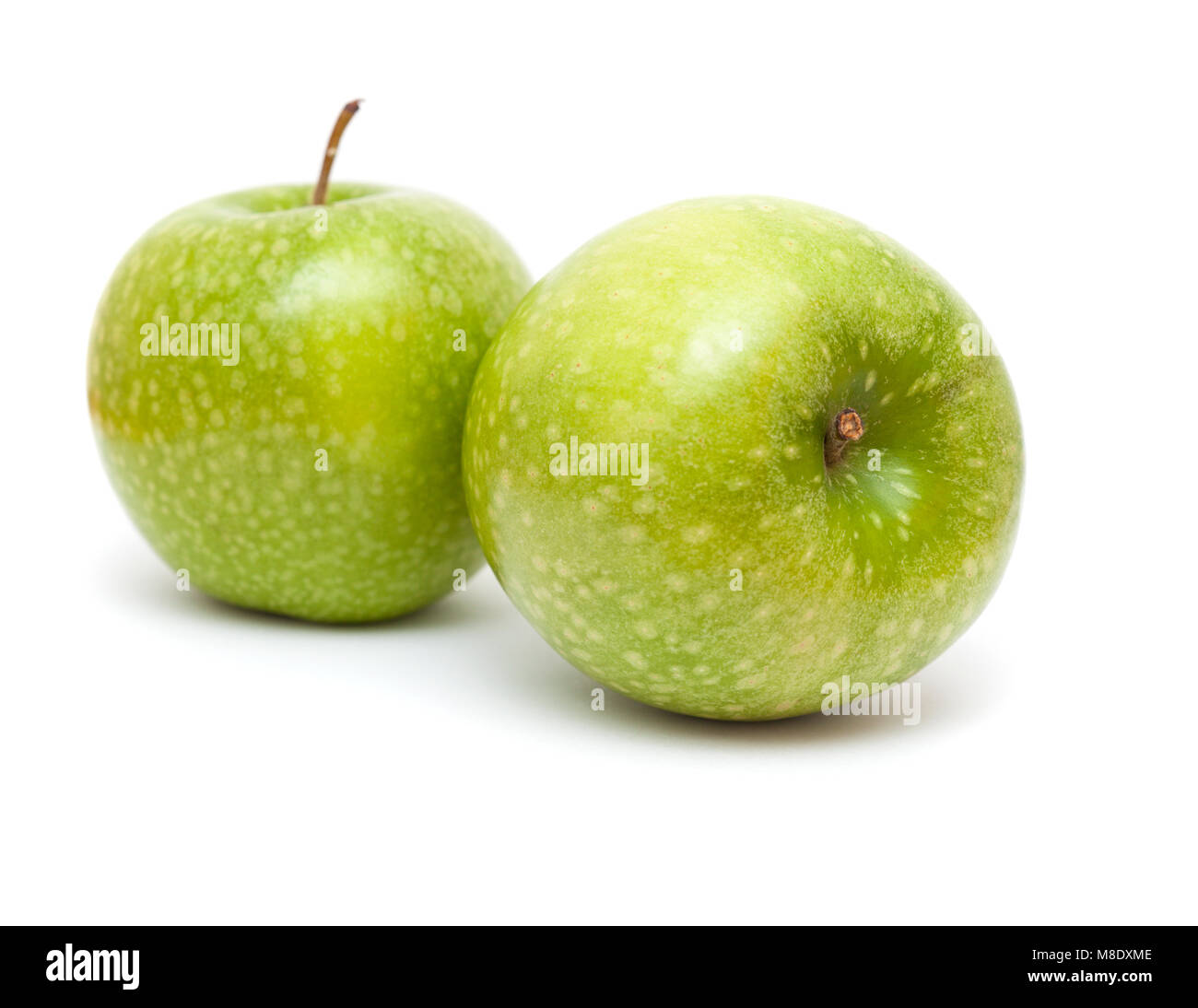 green variety of apple isolated on white background Stock Photo - Alamy