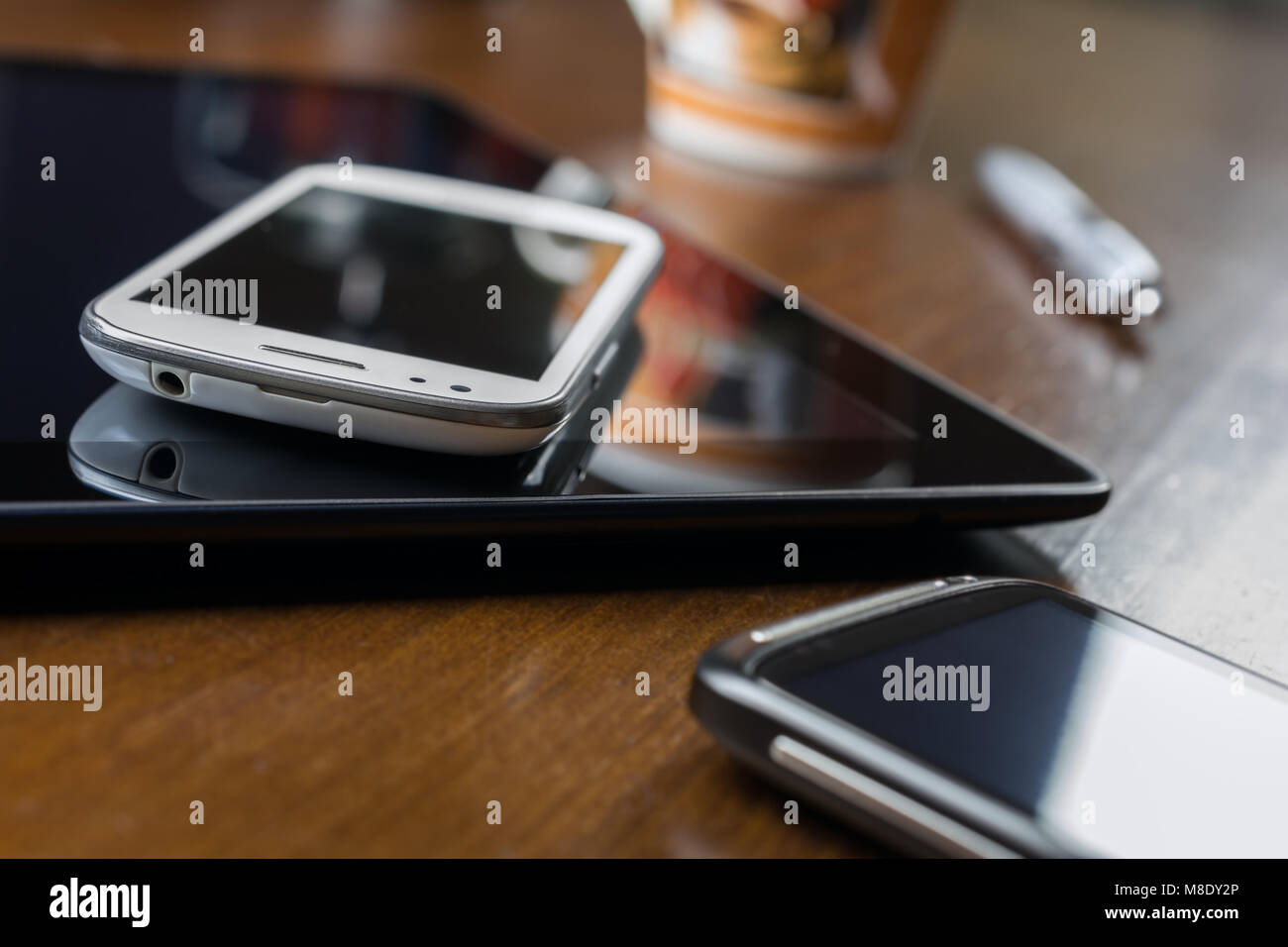Business Work With Tablet, Two Smartphones & Coffee Stock Photo - Alamy