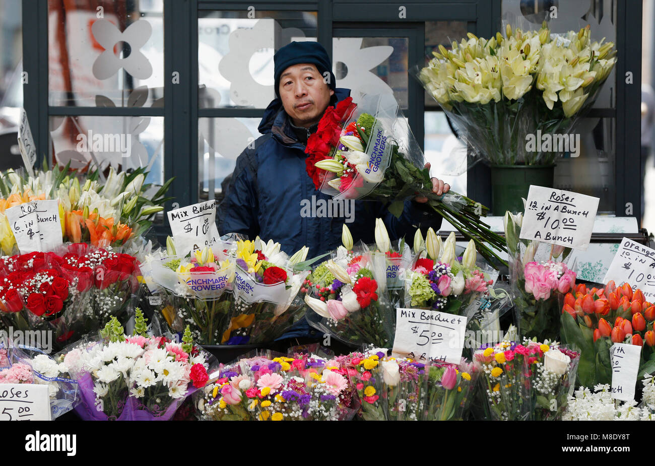 Asian man selling flowers hi-res stock photography and images - Alamy