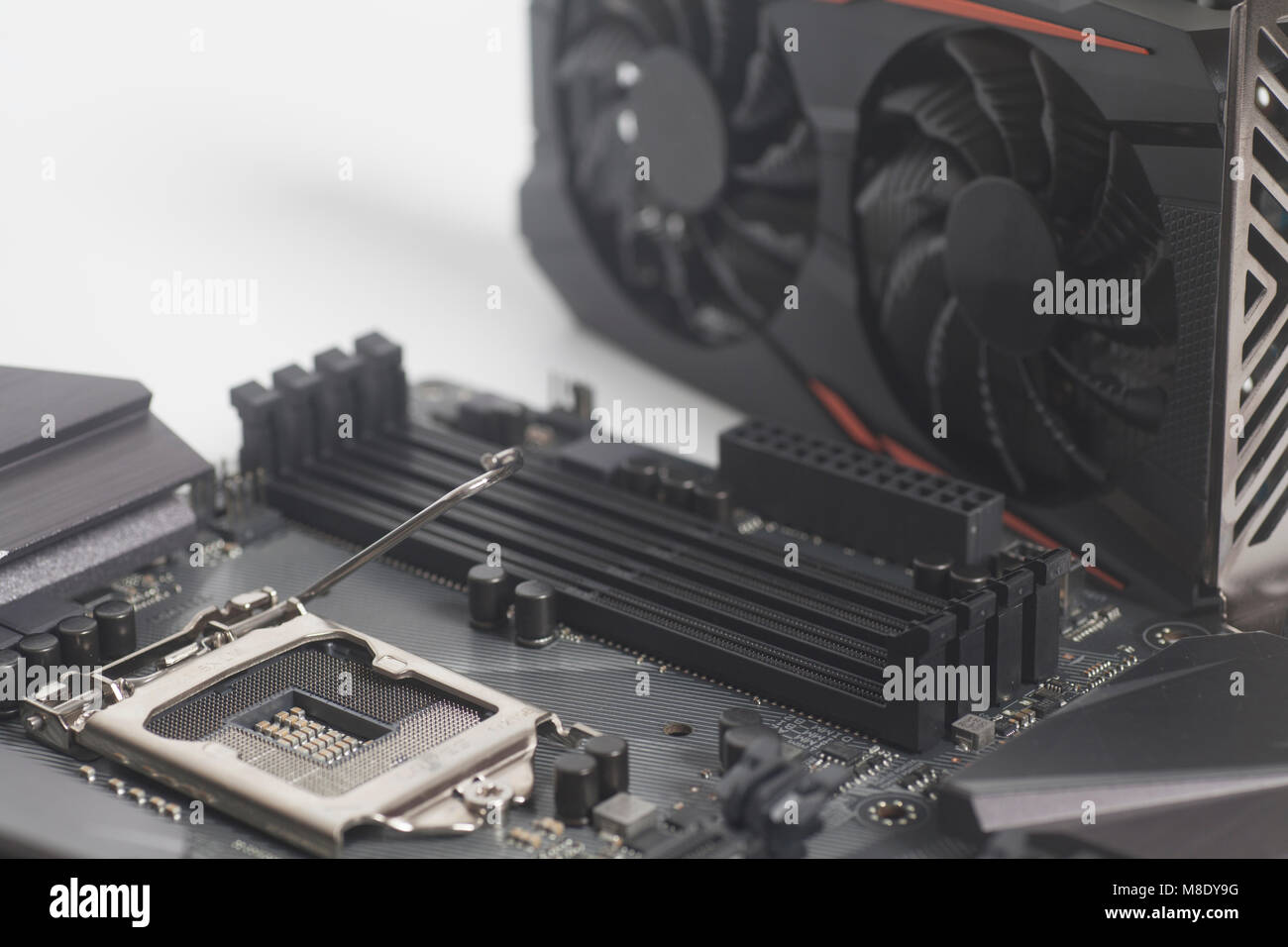 Motherboard with Graphic videocard on white background Stock Photo - Alamy