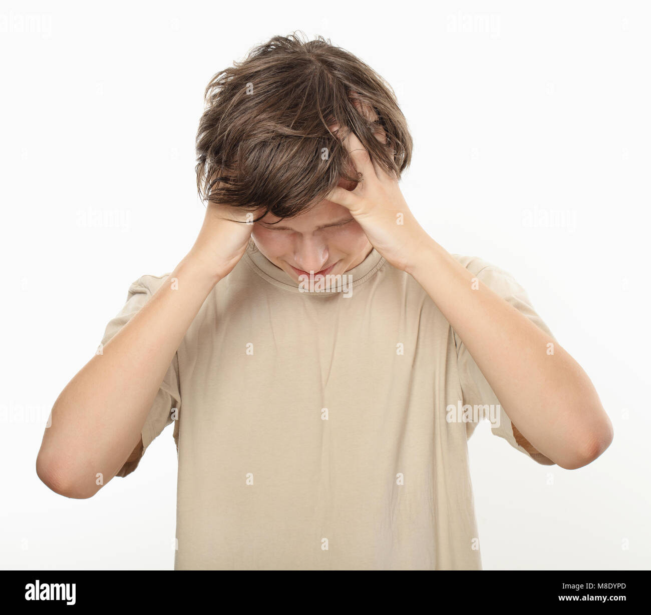 Guy in T-shirt trying to remember something important Stock Photo - Alamy