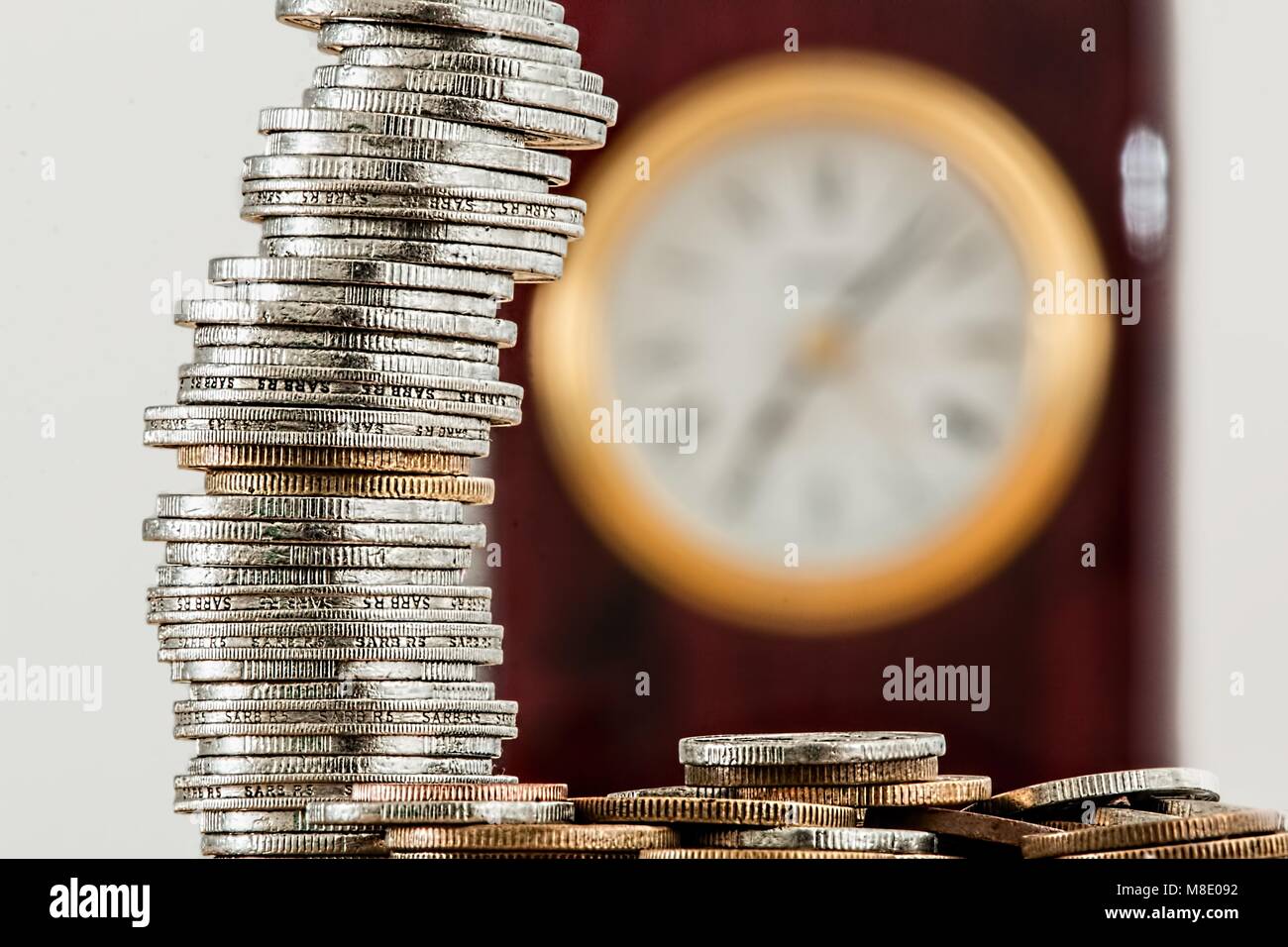 Time money stack coins hi-res stock photography and images - Alamy