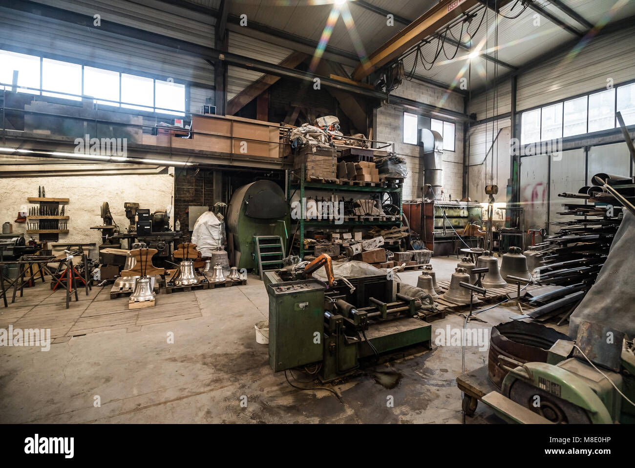 Bell manufacturing little factory indoor view, metal manufacturing ...