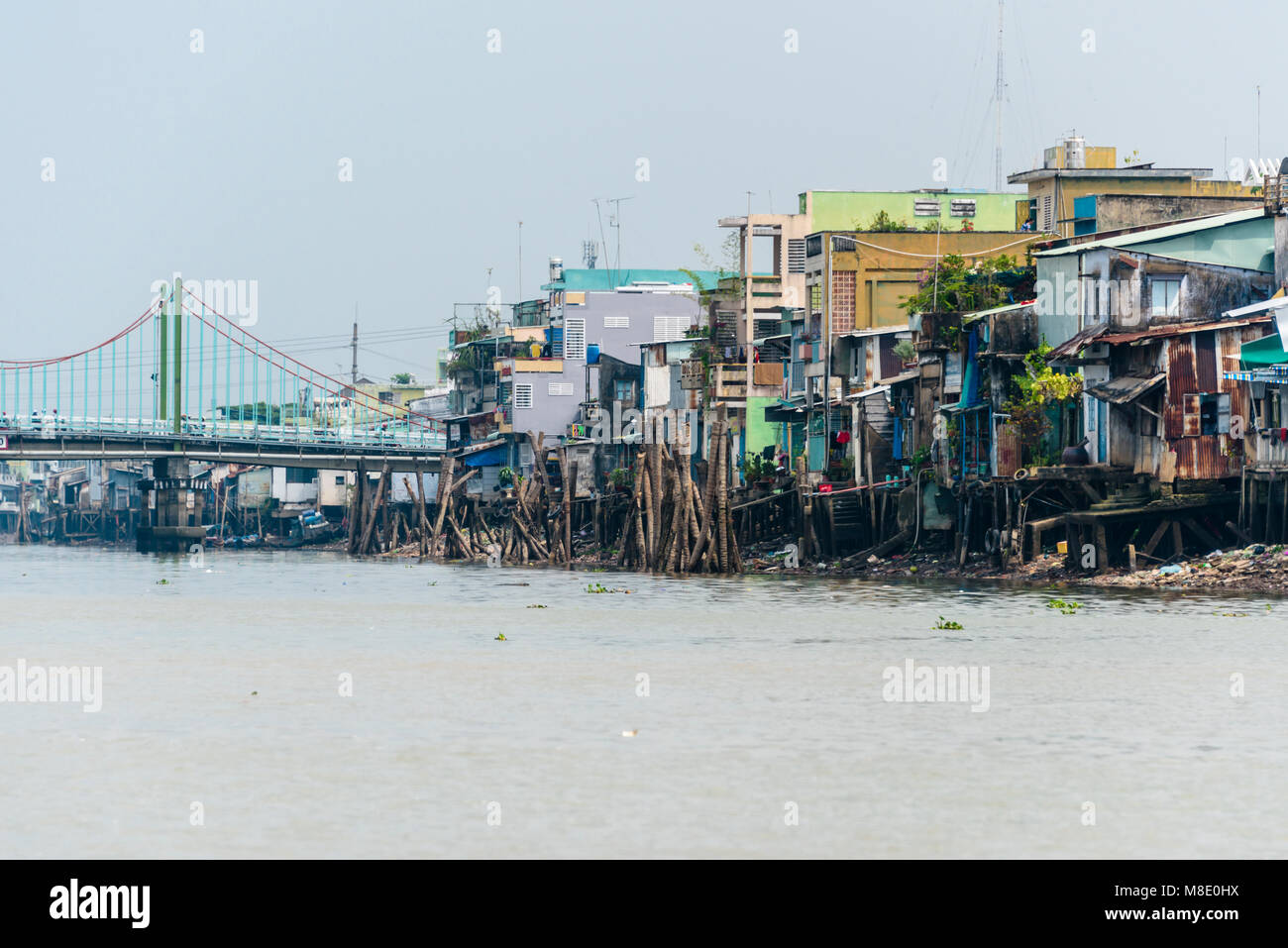 Makeshift houses on stilts made from corrugated iron, wooden sheets and ...