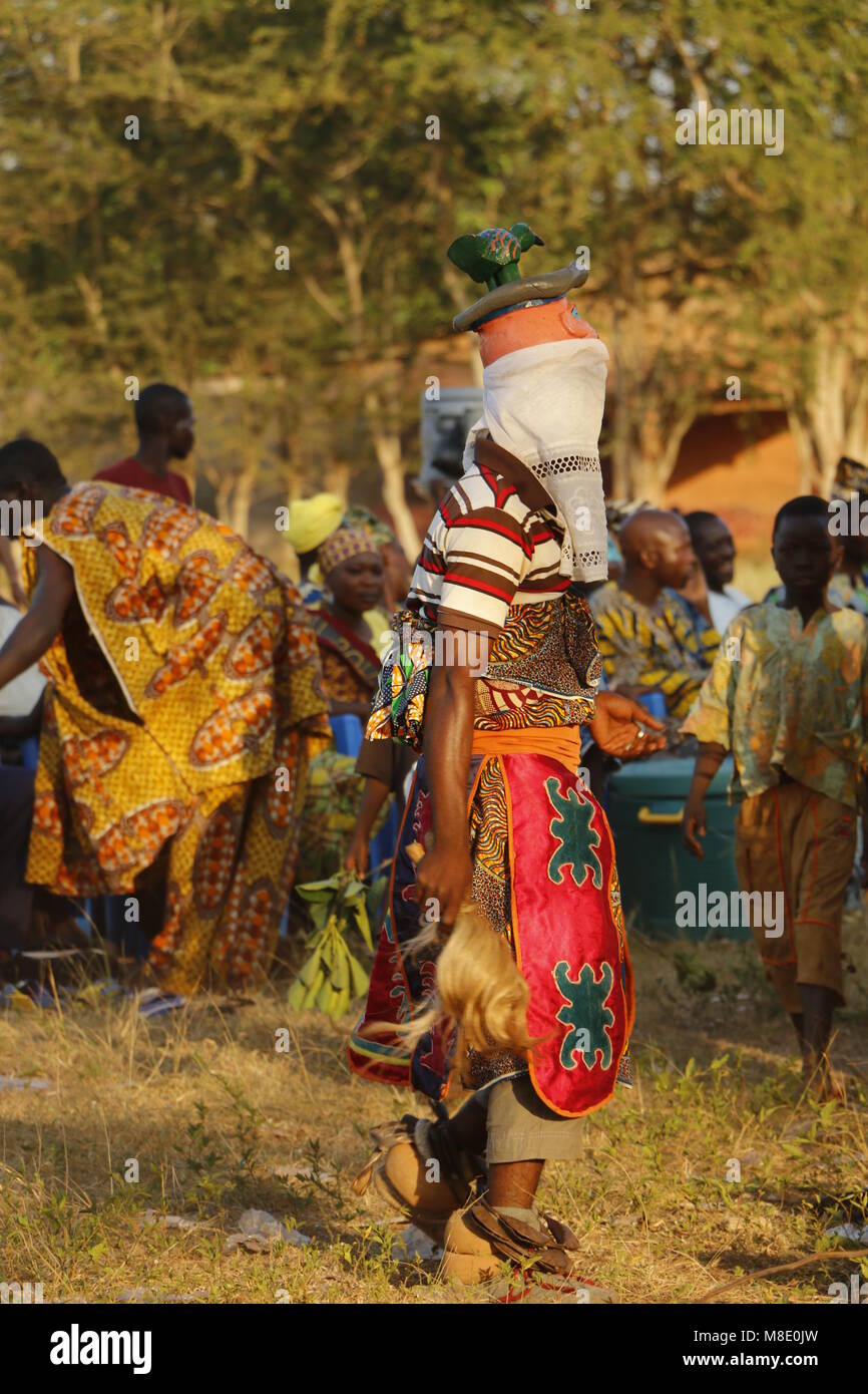 Gelede festival in Ketou Benin, Masked people have a competition with ...