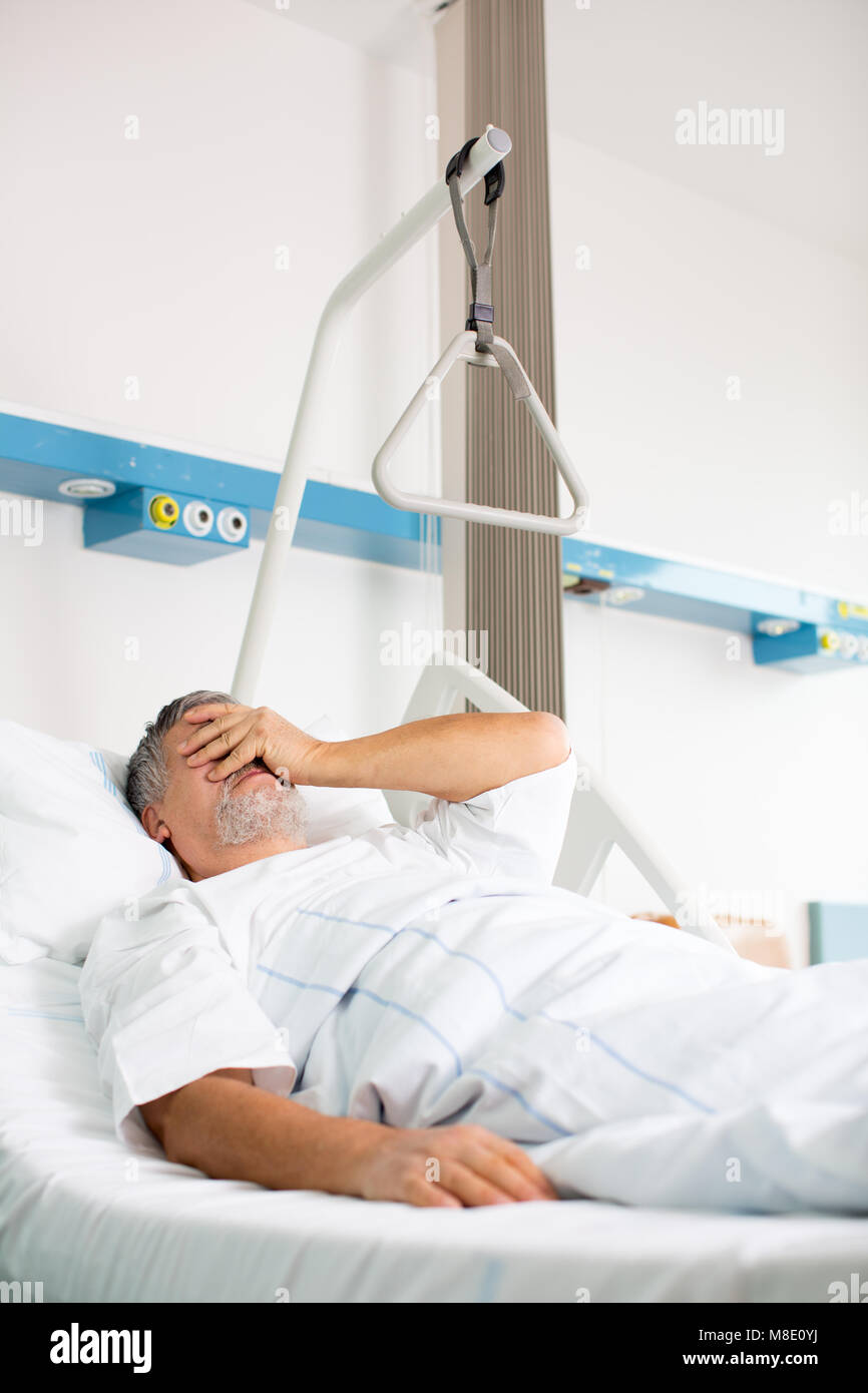 Patient in hospital room - suffering from pain after surgery Stock ...