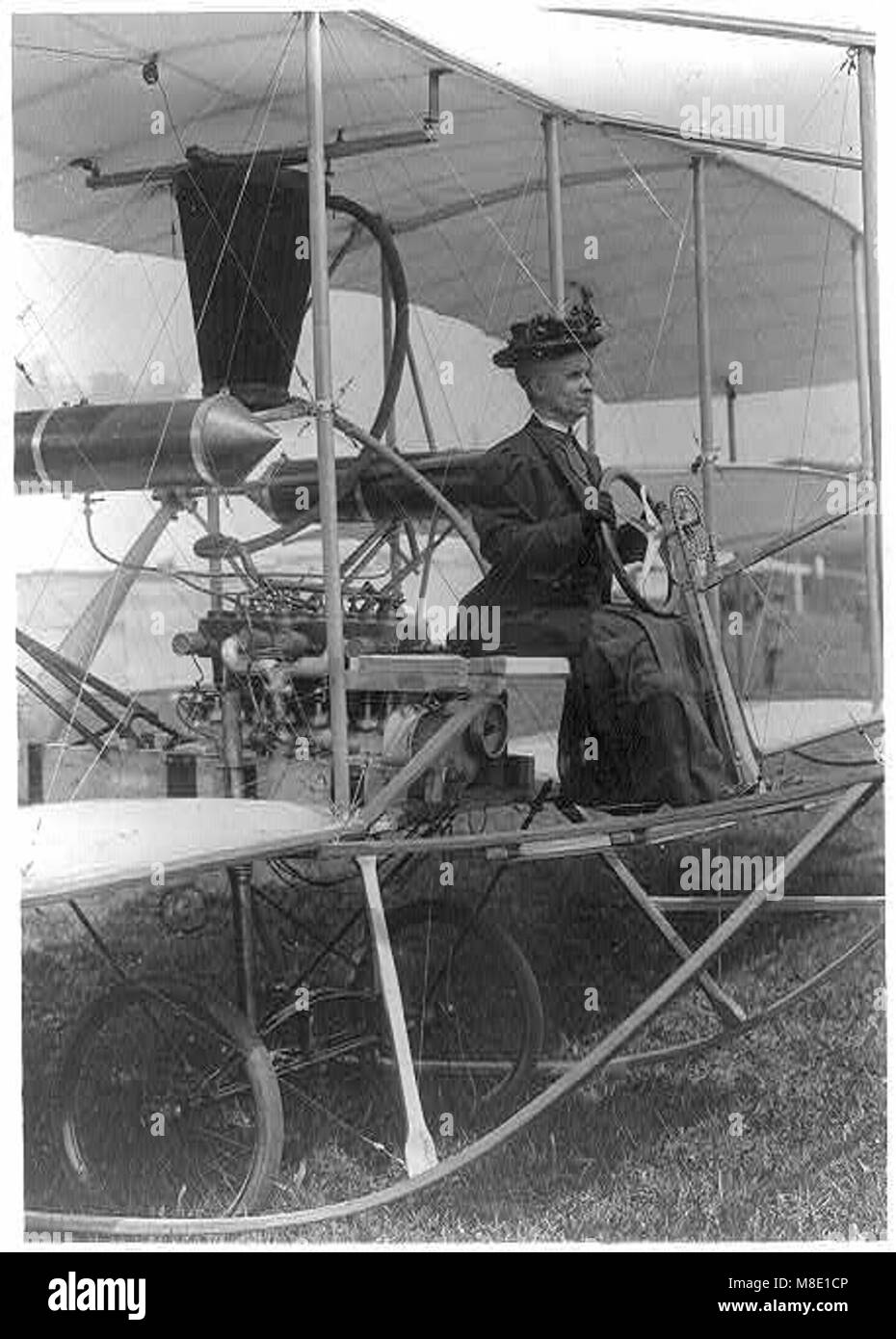 A photograph of Miss Todd in the cockpit of an airplane, likely from ...