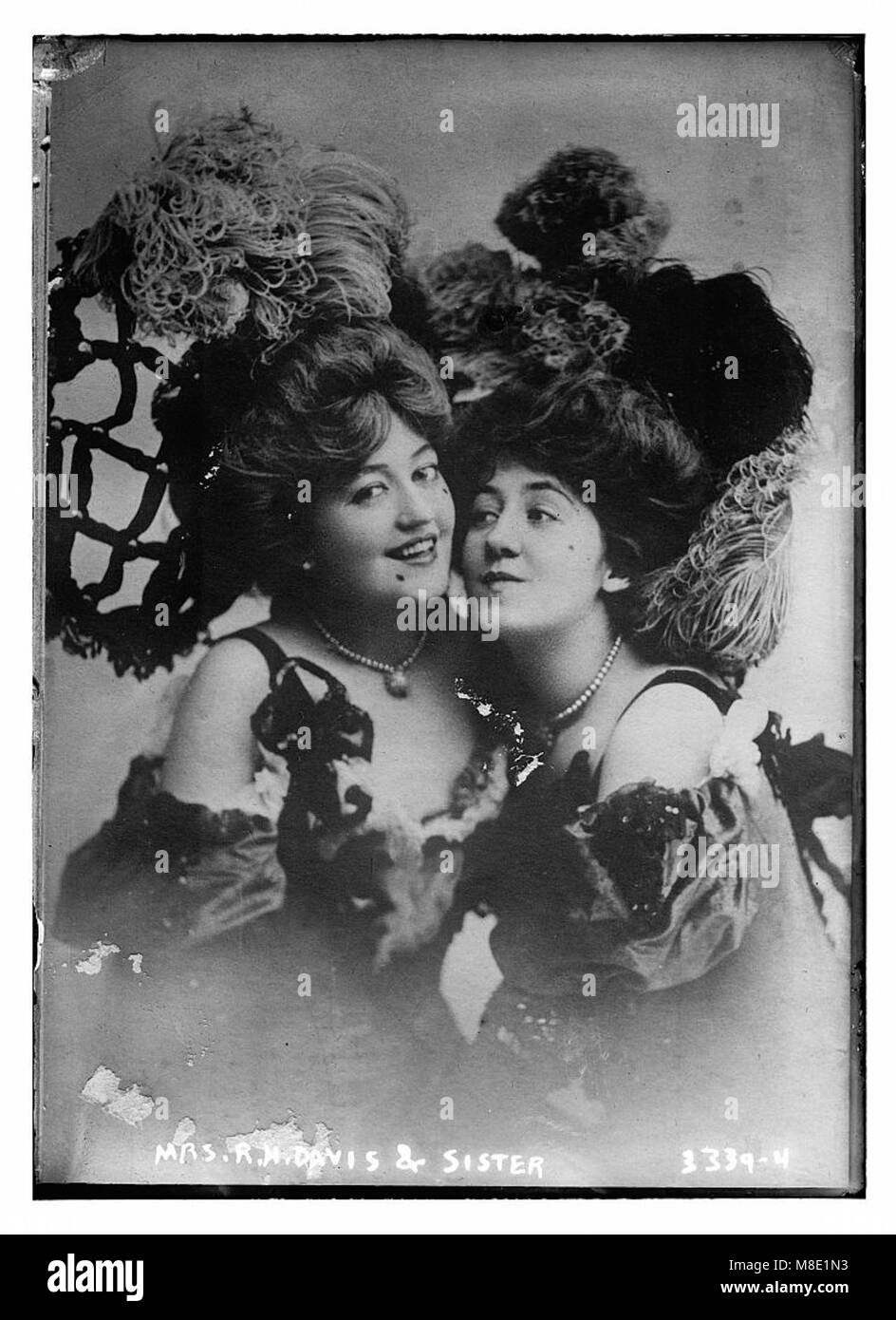 A photograph depicting Mrs. R.H. Davis and her sister, capturing a ...