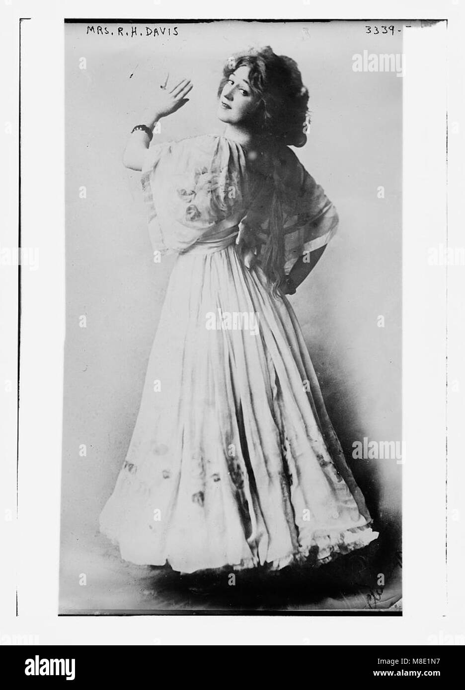 A portrait of Mrs. R.H. Davis, a notable figure in her time. The ...