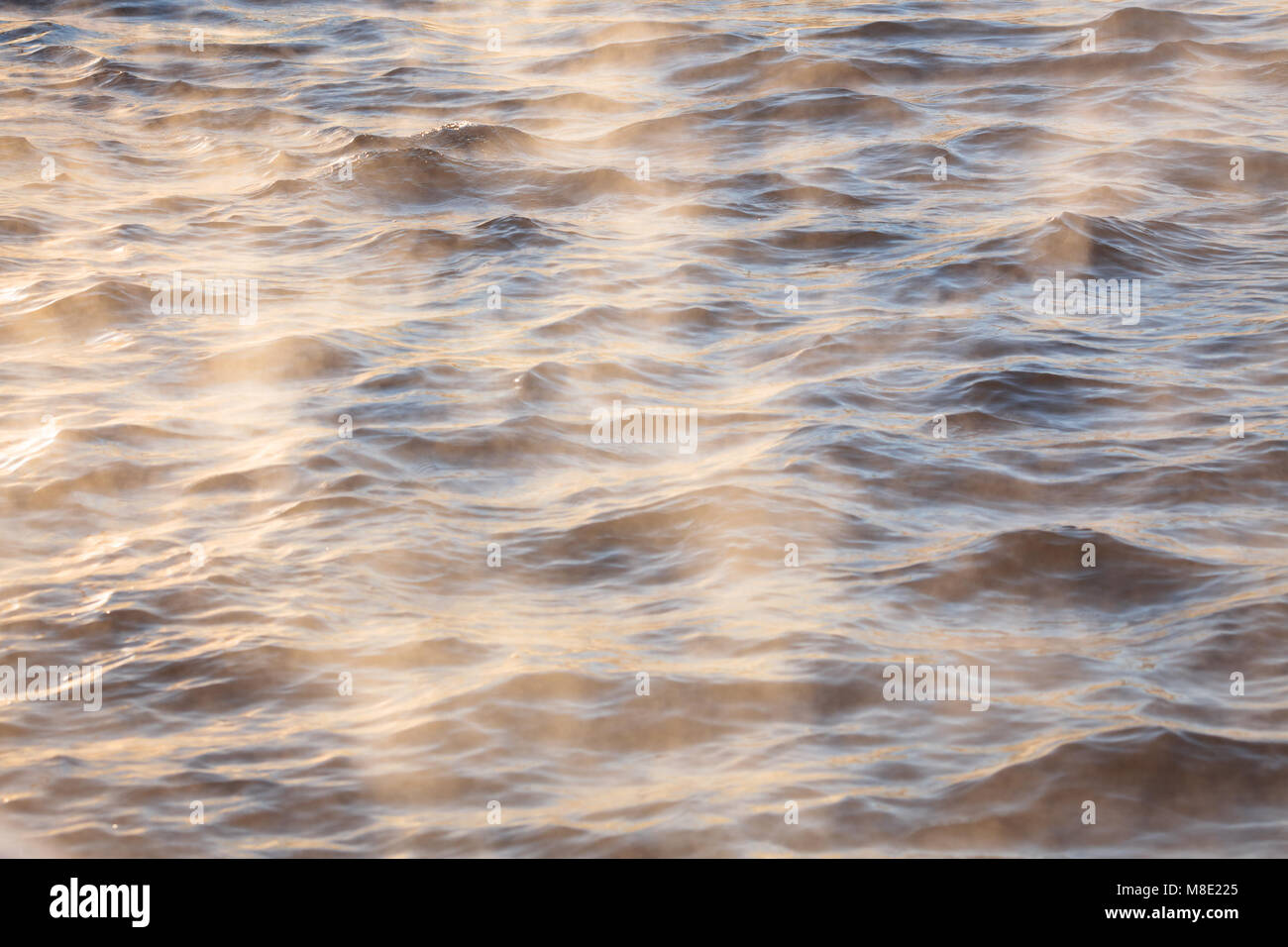 Water vapor on surface of cold water Stock Photo - Alamy