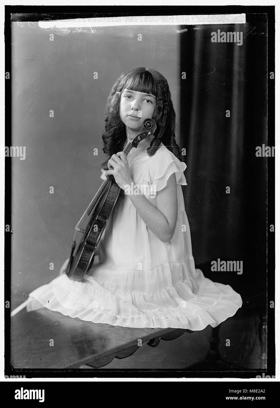 Gloria Perkins, portrayed in a formal portrait, represents an ...