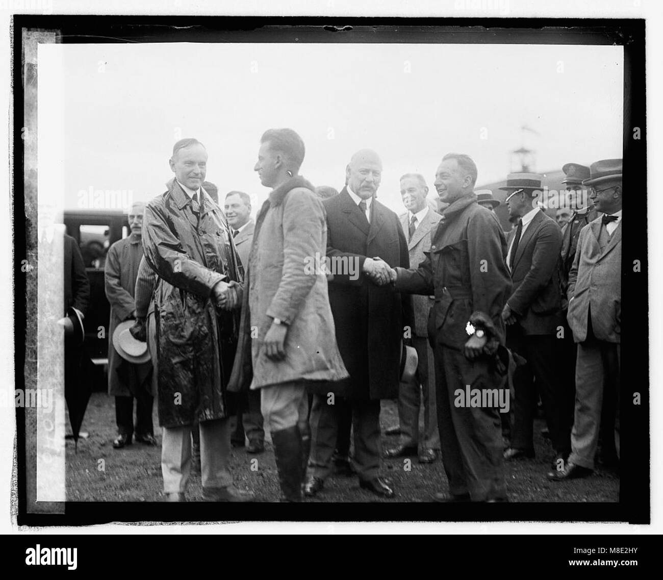 This photograph captures President Calvin Coolidge and Secretary of War ...