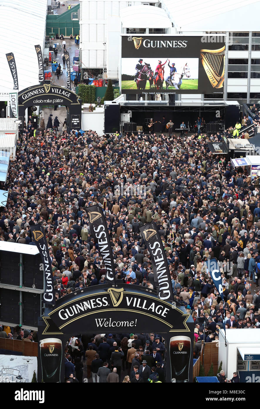 Racegoers in the Guinness Village on St Patrick's Thursday at ...