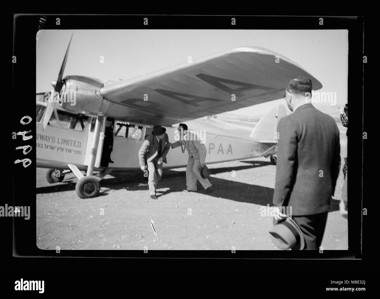 A photograph documenting the return of Sir Harold MacMichael from ...