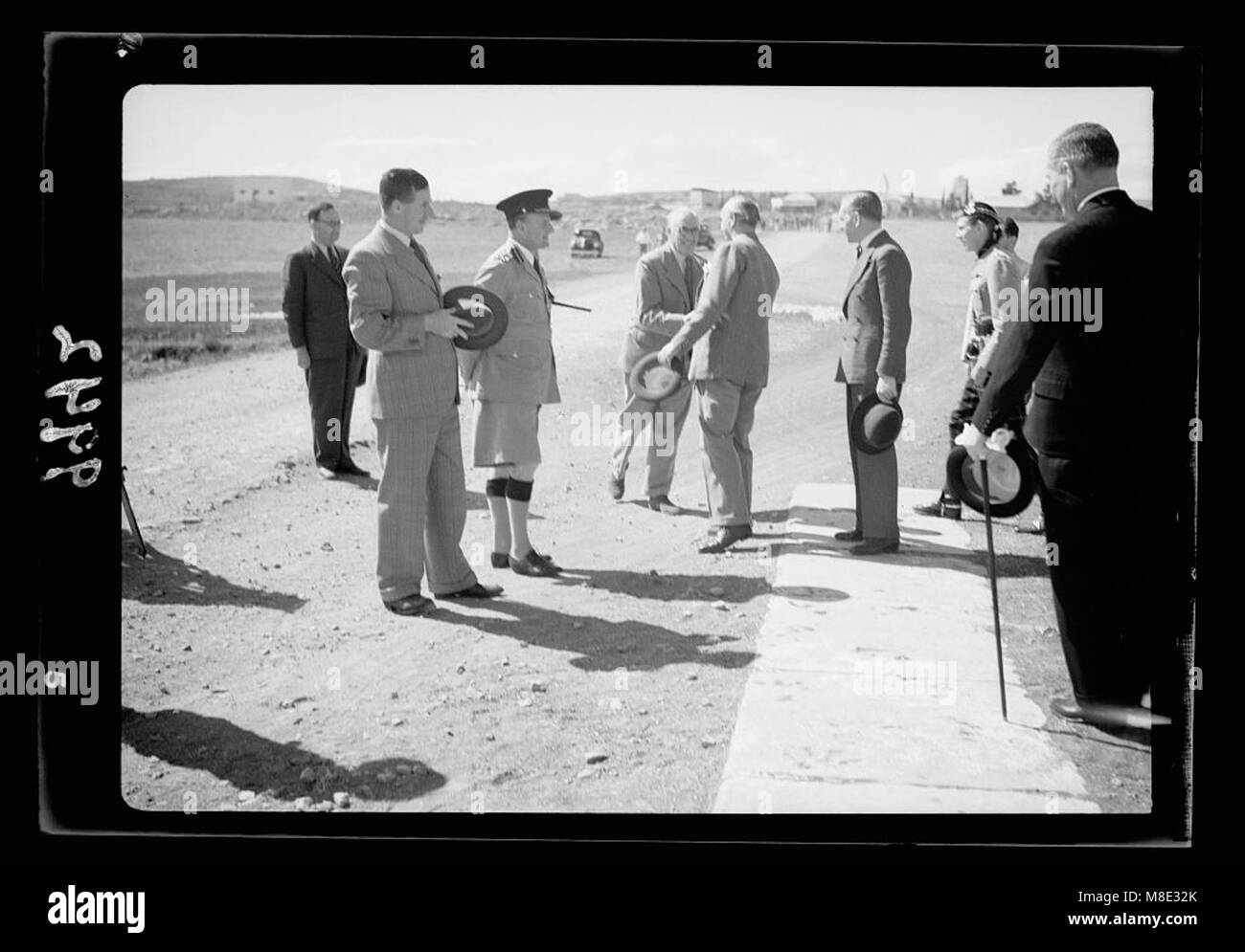 The photograph captures the return of Sir Harold MacMichael from London ...