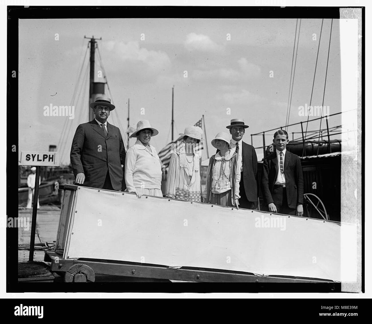 Secretary Wilbur and Attorney General Stone are pictured with their ...