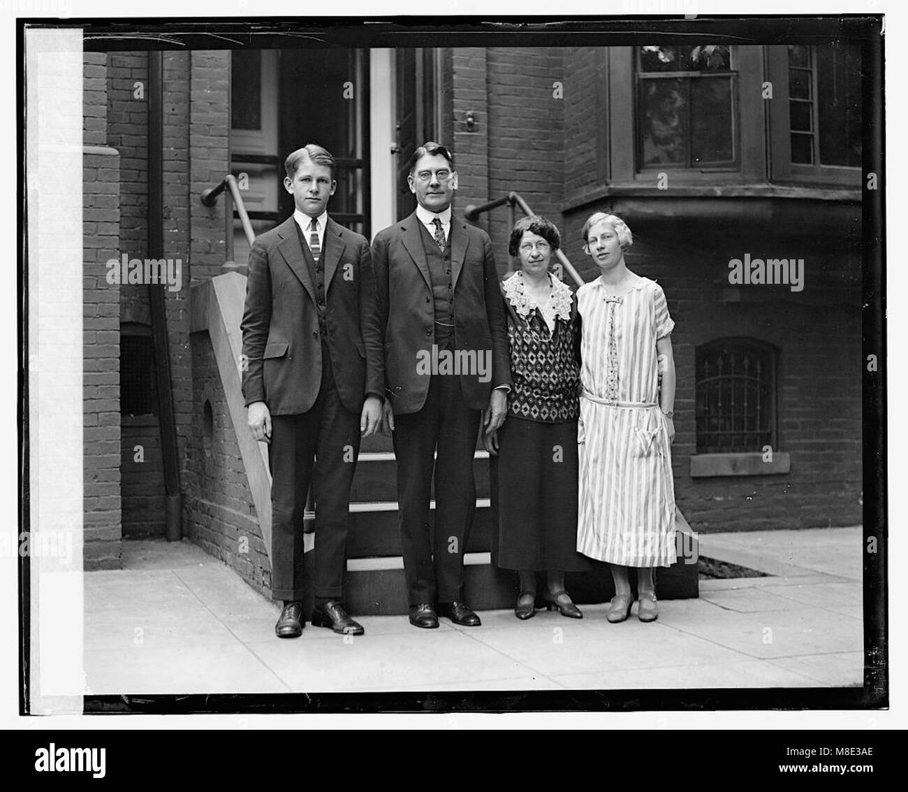 A family portrait featuring Secretary Wilbur, his wife, and two ...