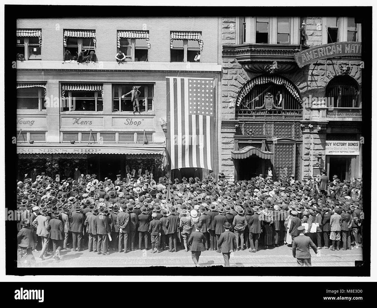 This image shows U.S. Shipping Board employees in front of a building ...
