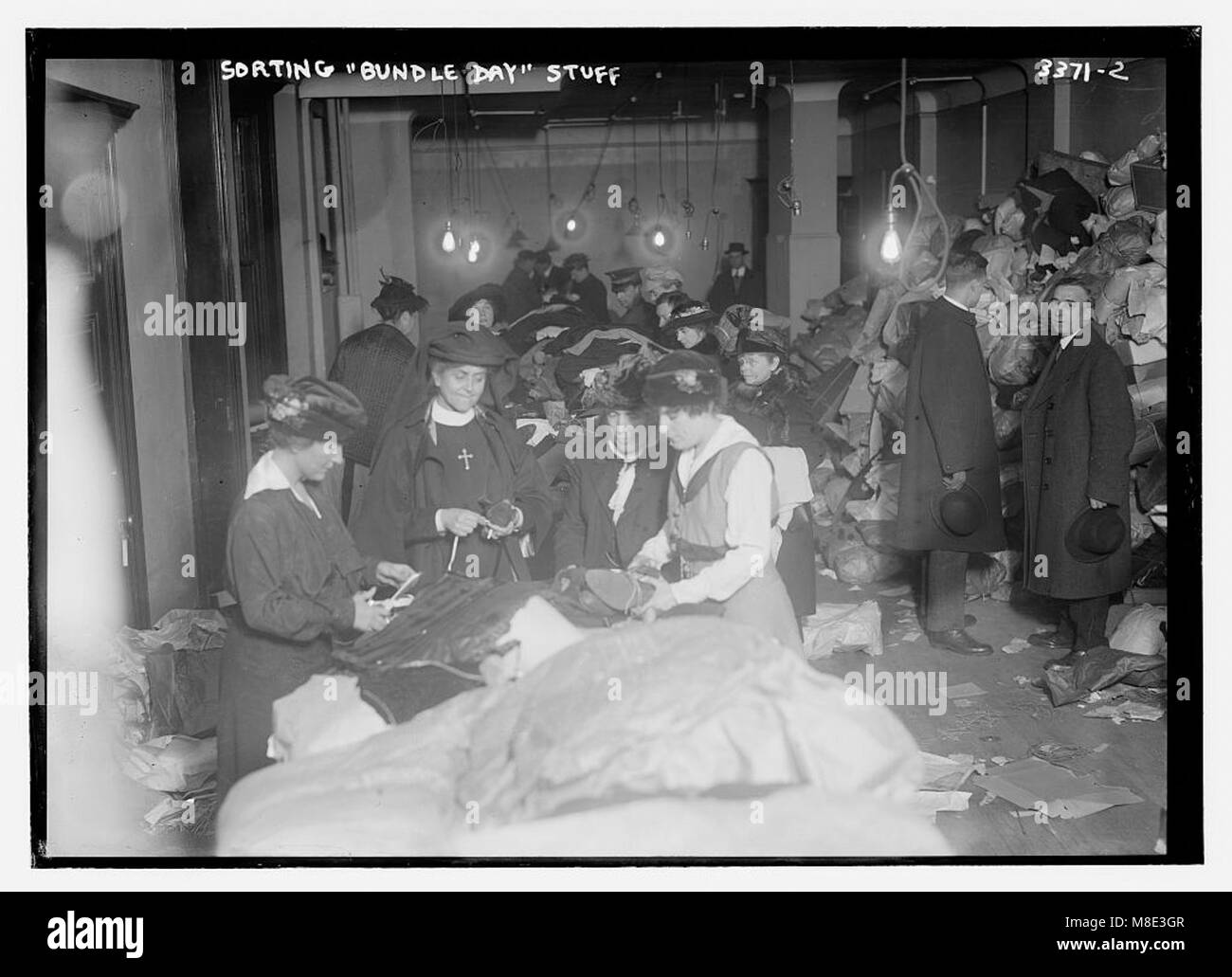 This photograph depicts a scene from a 'Bundle Day,' a charitable event ...