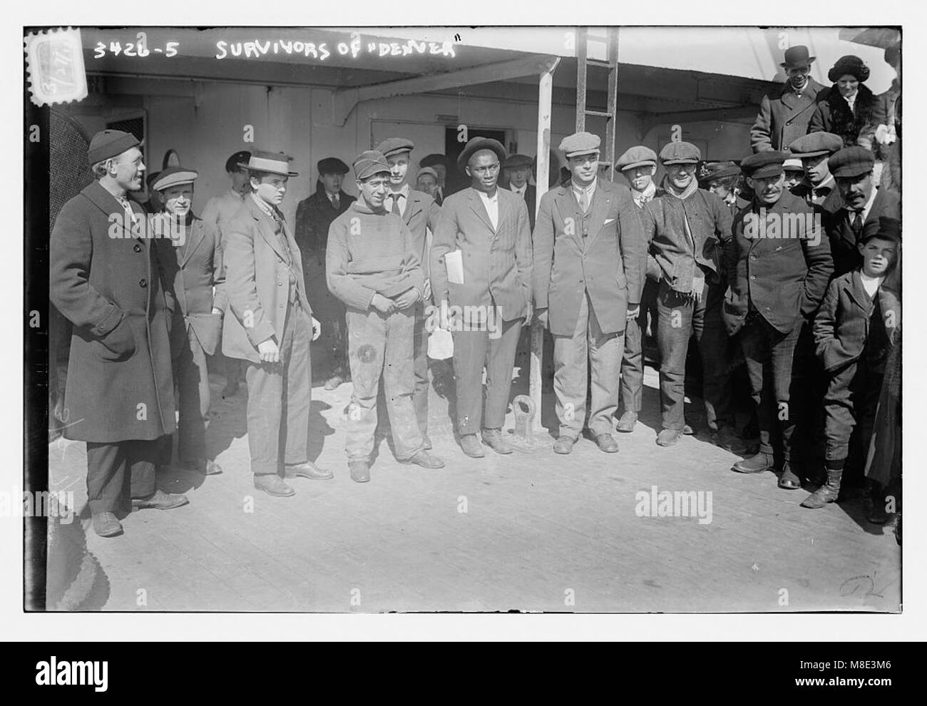 An image showing the survivors of the 'Denver,' a ship involved in a ...