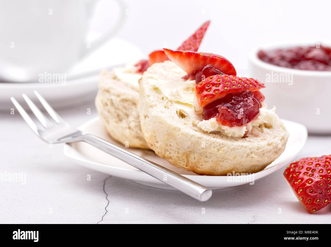 Devonshire Cream Tea (Cream on the bottom Jam on top Stock Photo - Alamy