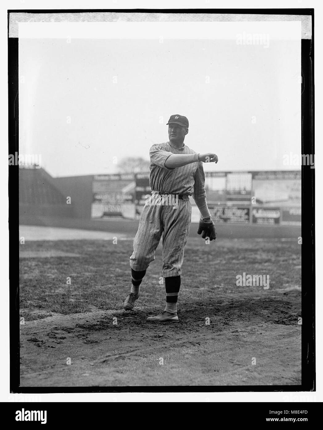 This photograph captures Walter Johnson, a legendary baseball pitcher ...