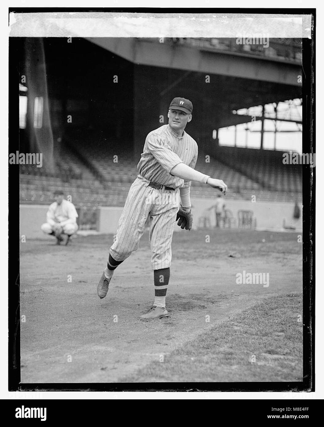 This image features Walter Johnson, a significant figure in baseball ...