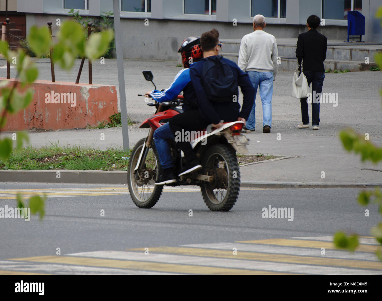 Motorbike rider without helmet hi-res stock photography and images - Alamy
