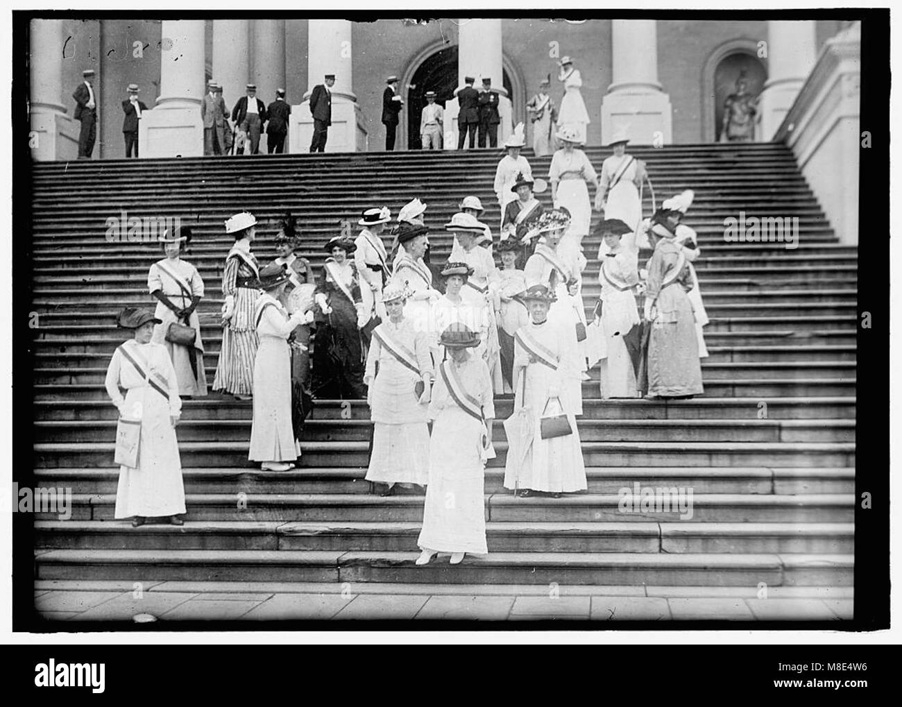 Photograph of a group of women advocating for suffrage rights, gathered ...