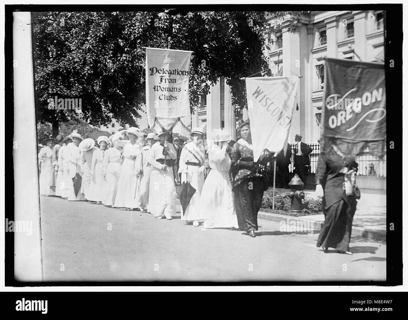 A historical photograph of a women's suffrage group gathered at the U.S ...