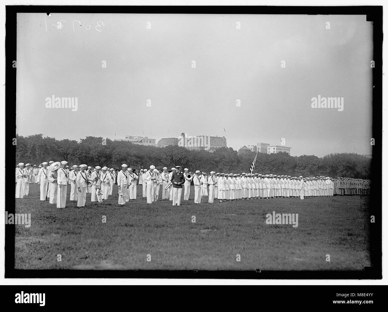 This image shows a Yeoman (F) from the U.S. Navy being reviewed by ...