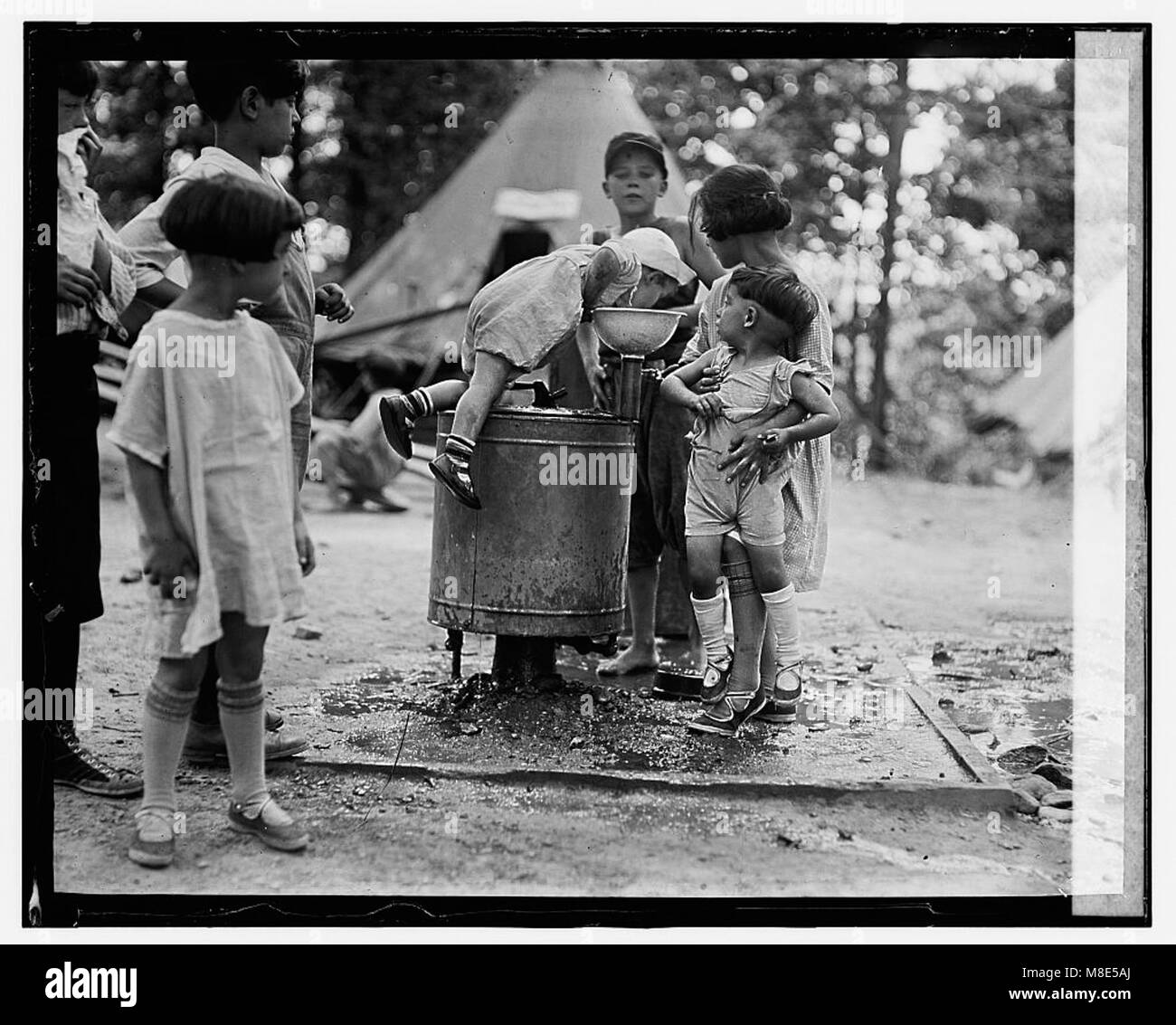 A photograph capturing a scene from Camp Good Will, dated August 1 ...