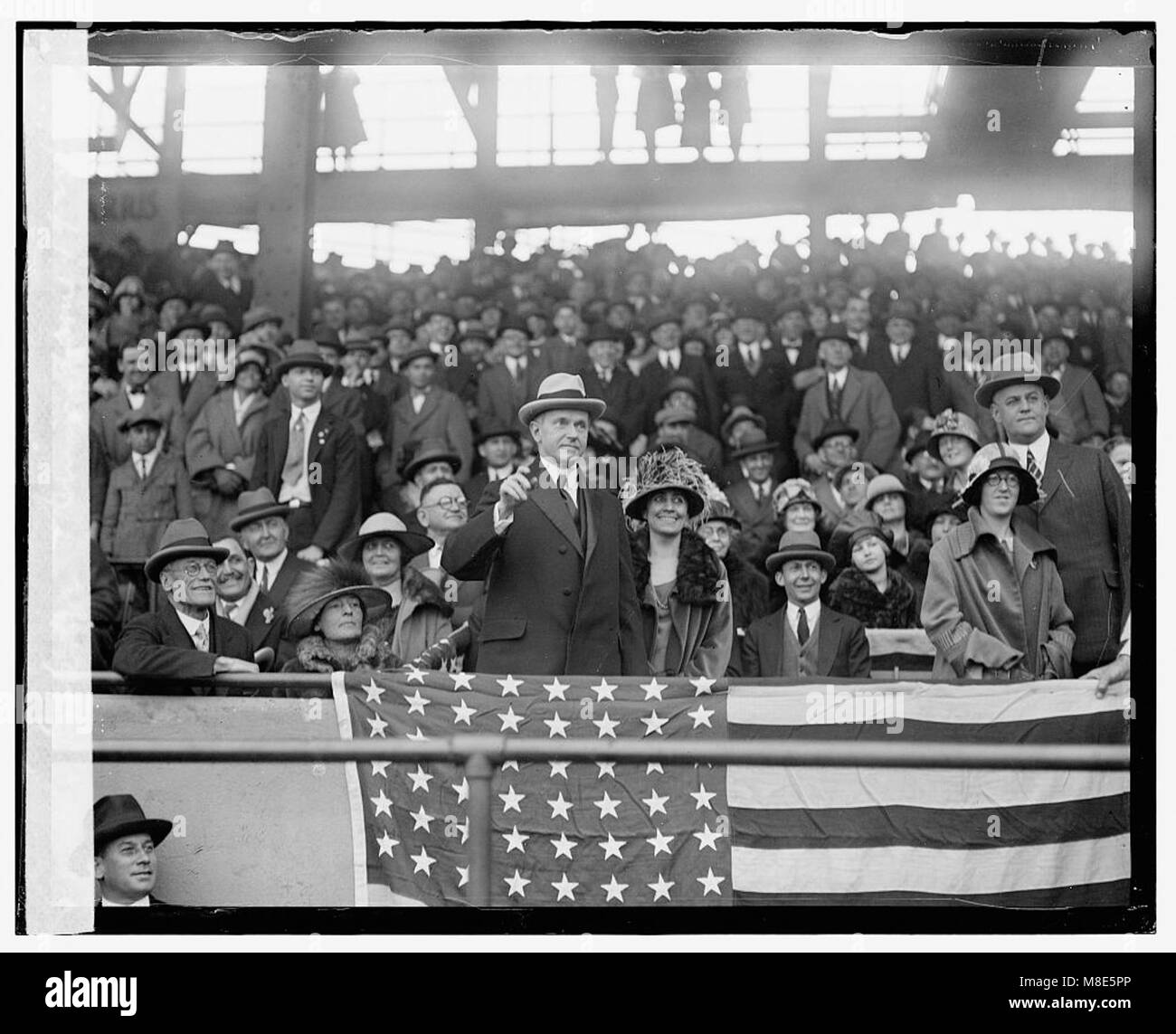 A photograph capturing President Calvin Coolidge at the opening game in ...