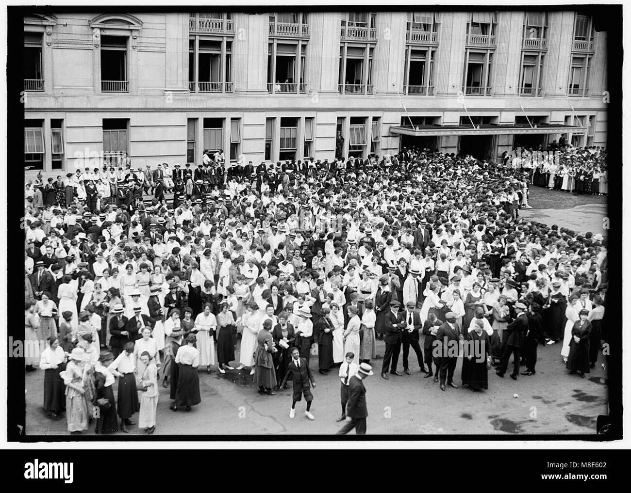 A crowd scene depicting a large group of people gathered for an event ...