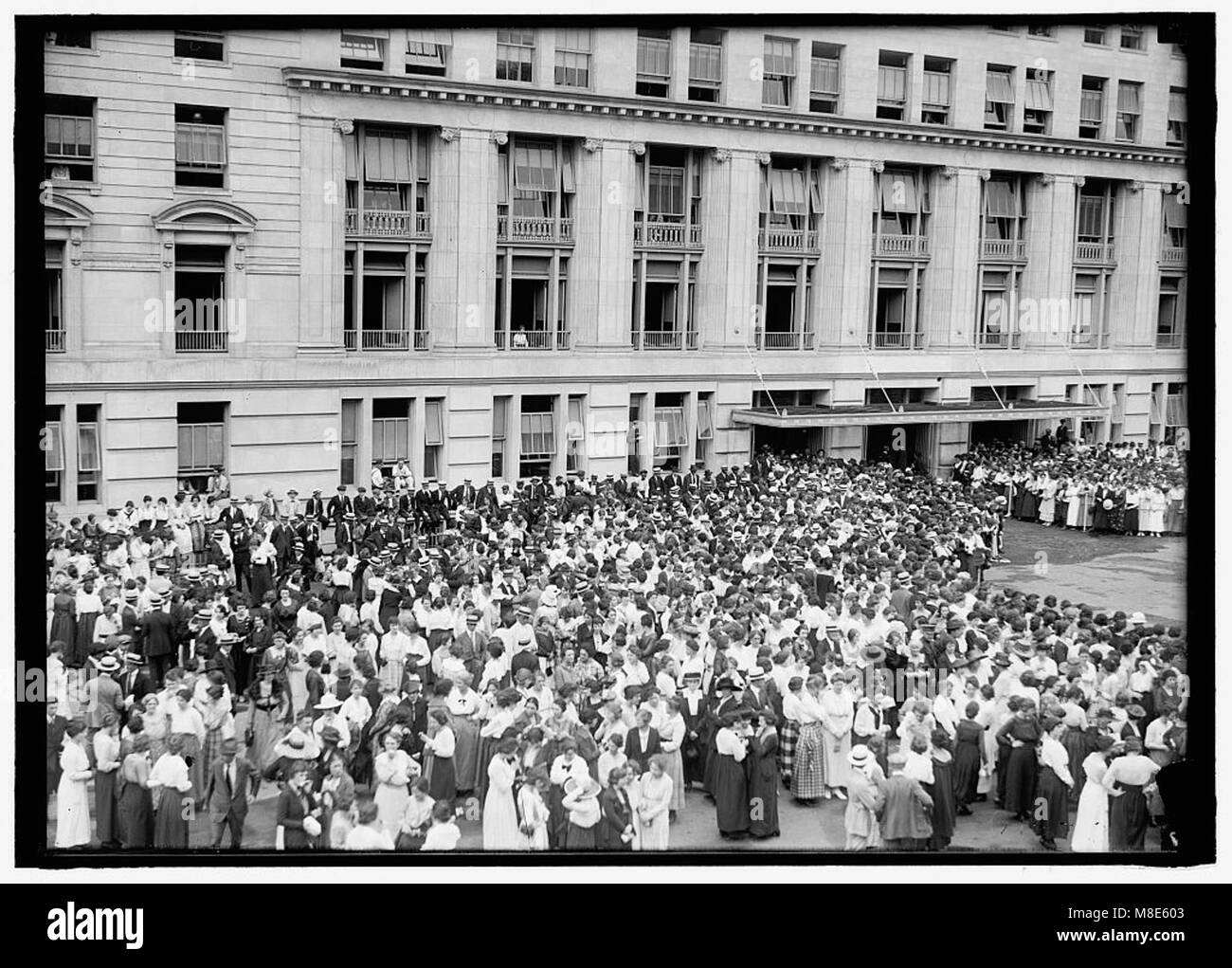 A photograph depicting a crowd scene, capturing a public gathering or ...