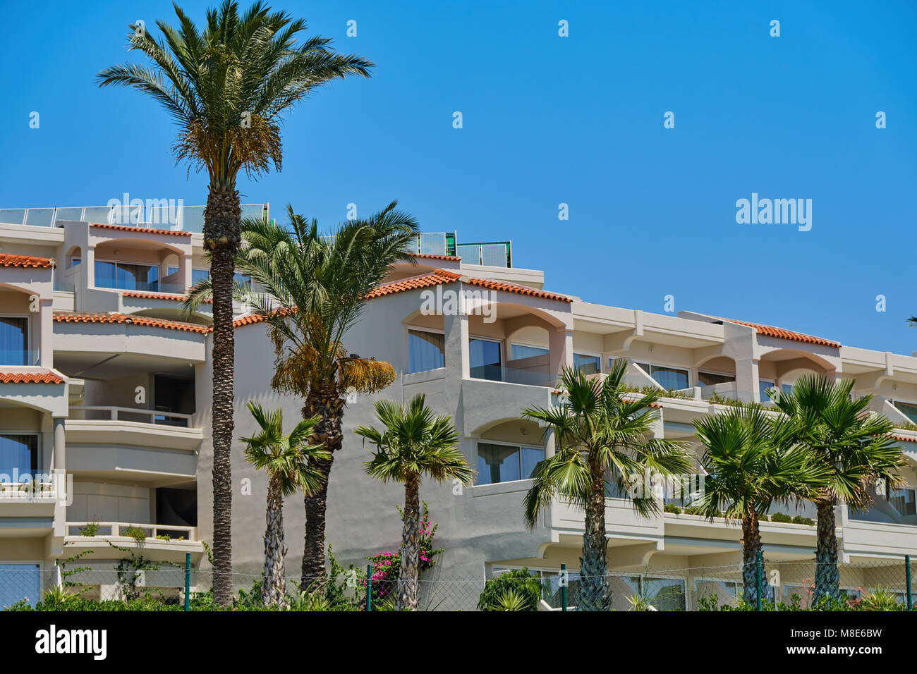 Hotel building with balcony on the sea Stock Photo - Alamy