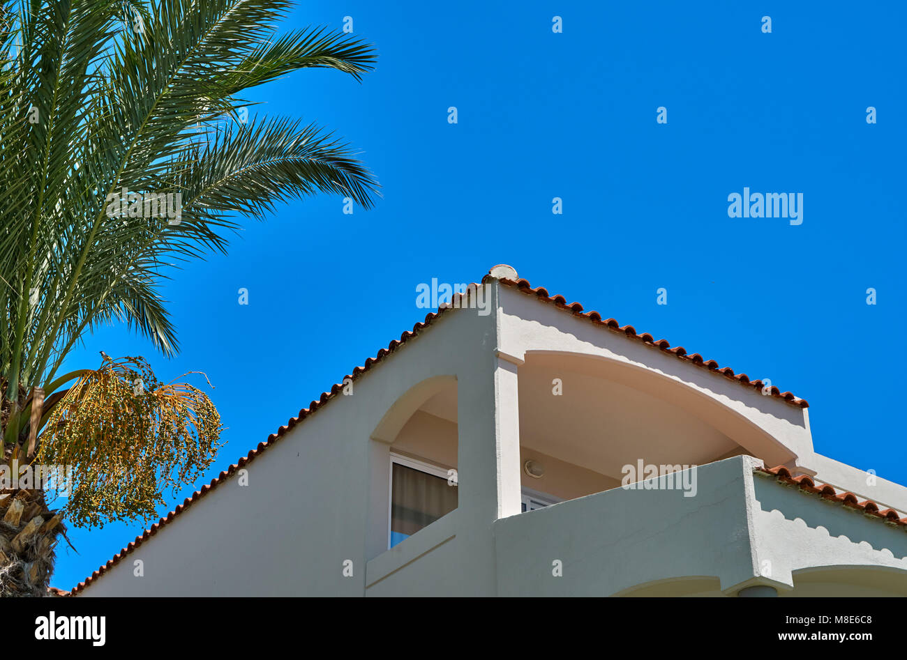 Hotel building with balcony on the sky background Stock Photo - Alamy