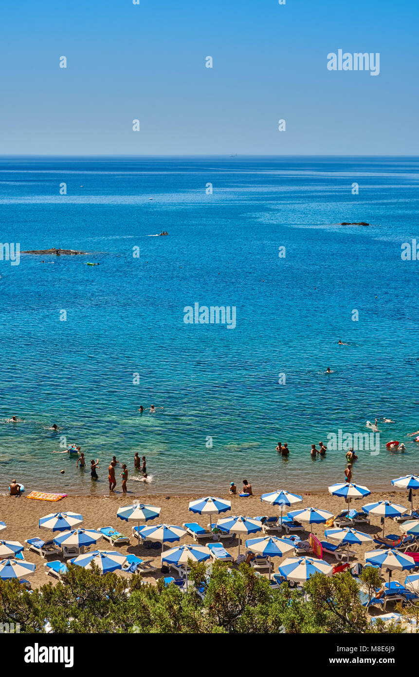 Resort hotel beach near bay on Rhodes island in Greece. Summer vacation ...