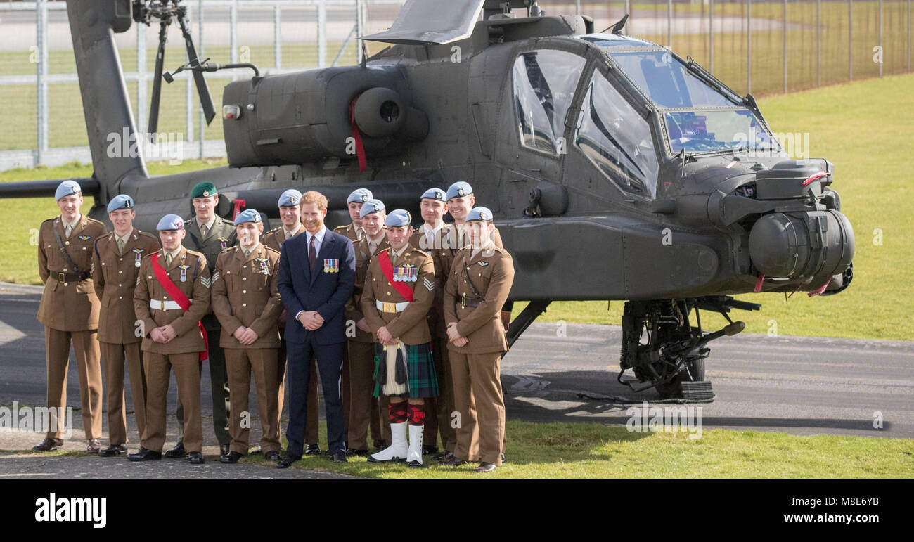 Prince Harry (front row 2nd right) poses for a photograph in front of ...