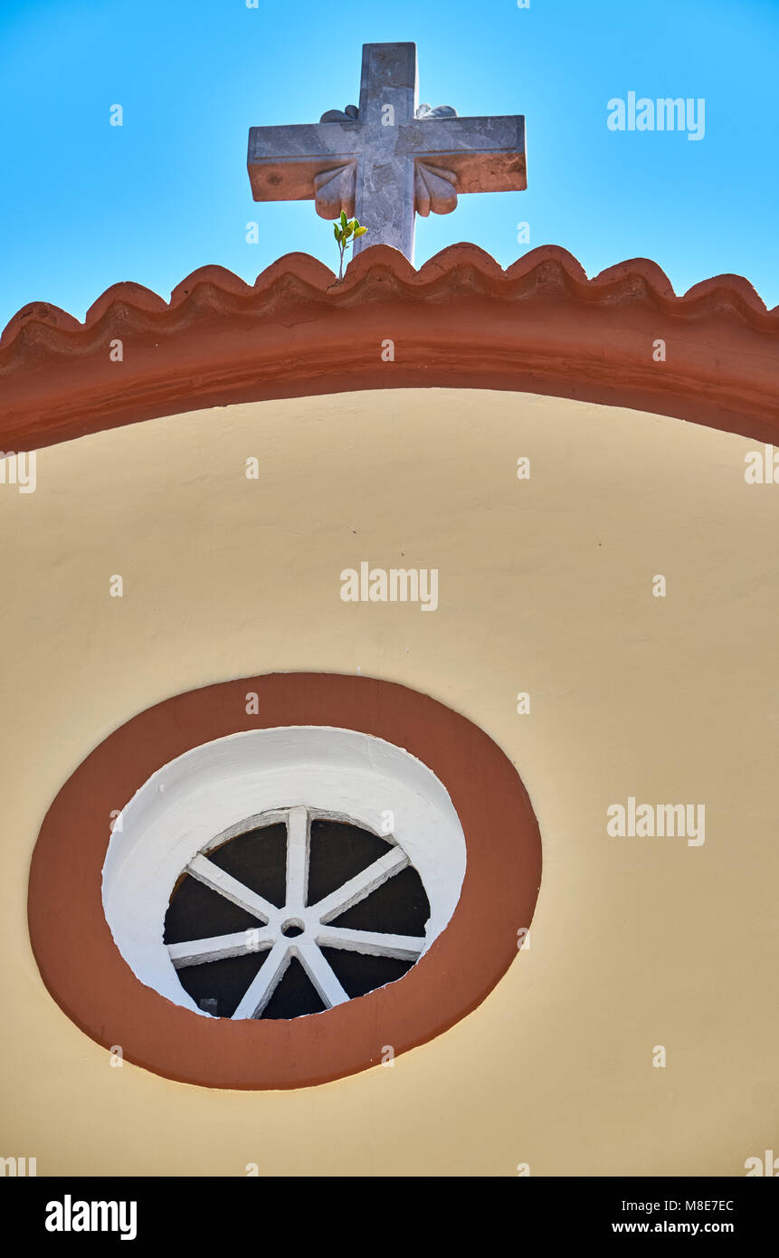 Cross on a house wall hi-res stock photography and images - Alamy